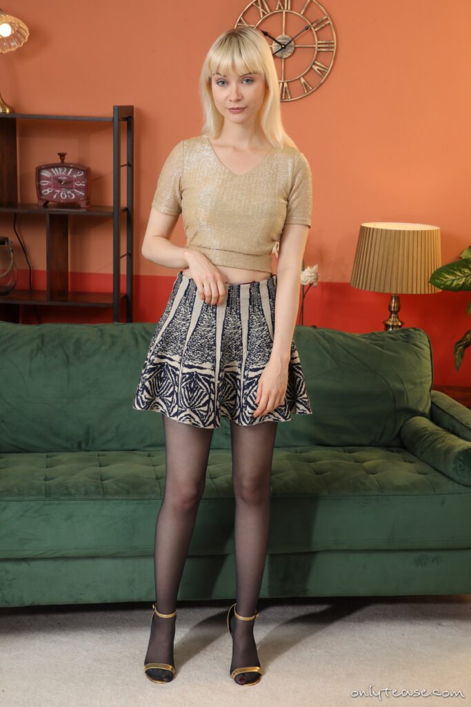 Only Tease Jessica Louise In A Short Skirt And Sheer Black Stockings